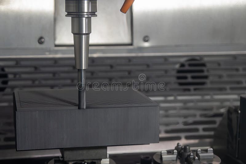 The CNC Milling Machine Rough Cutting the Graphite Electrode Parts with ...