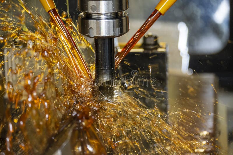The CNC Milling Machine Rough Cutting the Mold Parts with Liquid ...