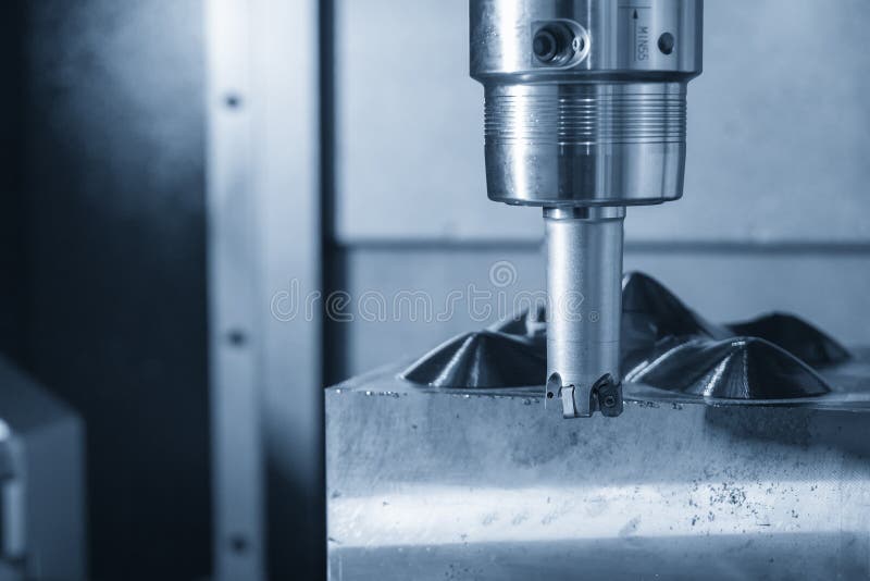 The CNC Milling Machine Rough Cutting the Mould Parts with the ...