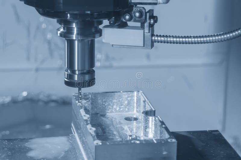 The CNC Milling Machine Tapping Process at Aluminum Parts in the Light ...