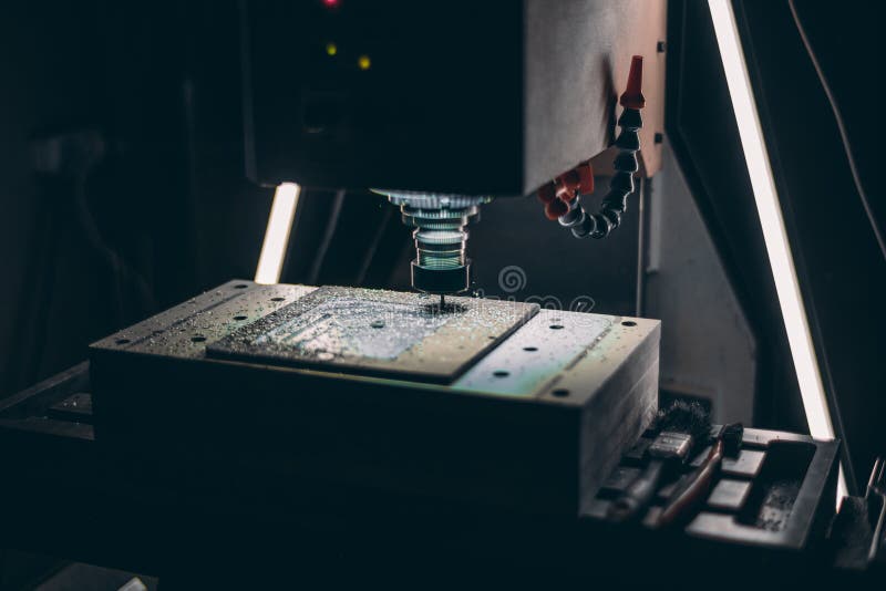 CNC milling in progress stock photo. Image of machine - 92729010