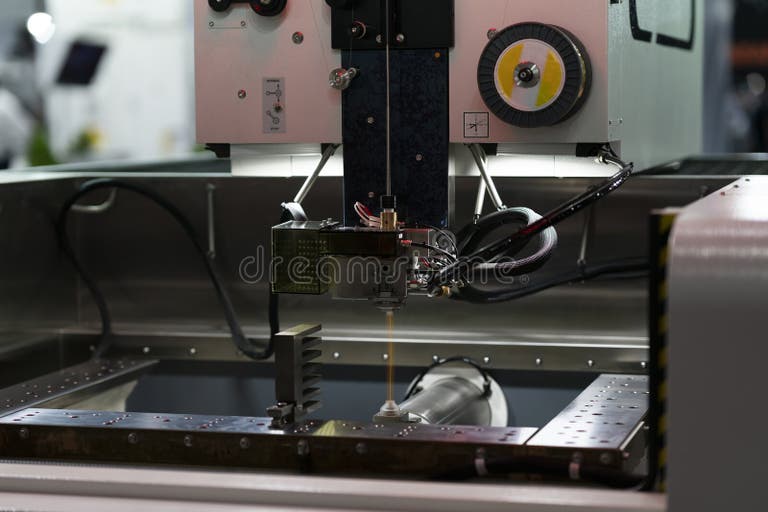 CNC Wire Cut Machine Cutting High Precision Mold Parts Stock Image ...