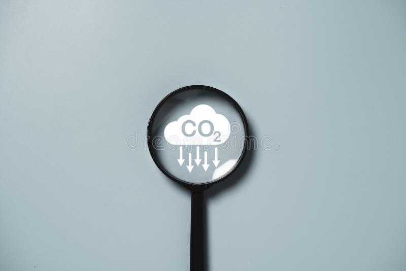 CO2 Reducing Icon Inside Magnifier Glass for Focusing Decrease CO2 or Carbon Dioxide Emission ...