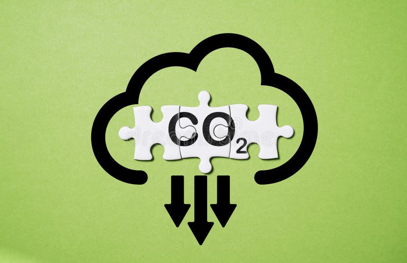 CO2 Reducing Icon on White Jigsaw for Decrease CO2 , Carbon Footprint ...