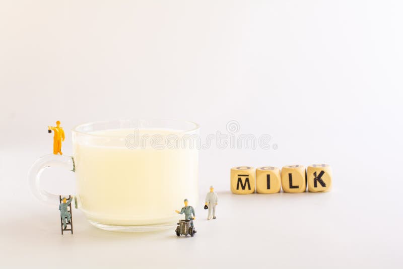Co Werker and Team Work Concept. Miniature Work with Cup of Milk Stock ...
