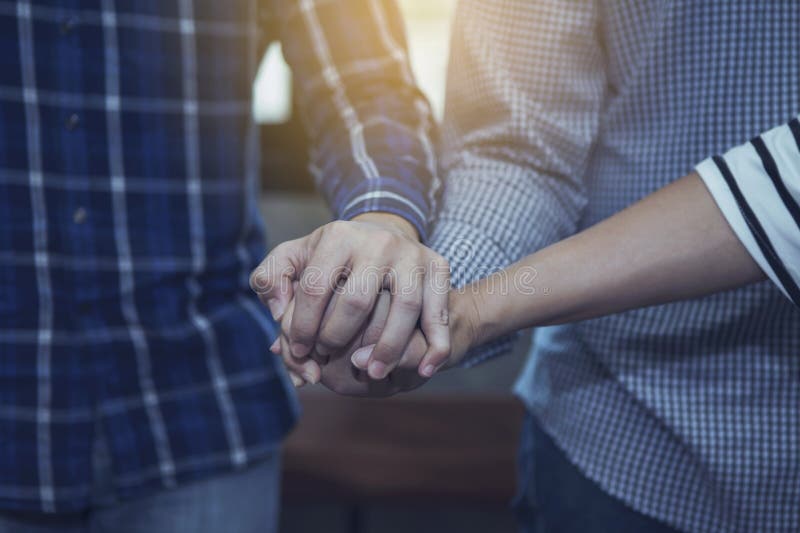 Co Worker Join Hands Together in the Office for Unity, Team Work ...