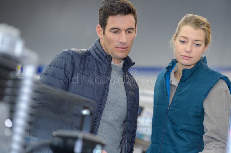 Co-worker Looking Down in Warehouse Stock Image - Image of container ...