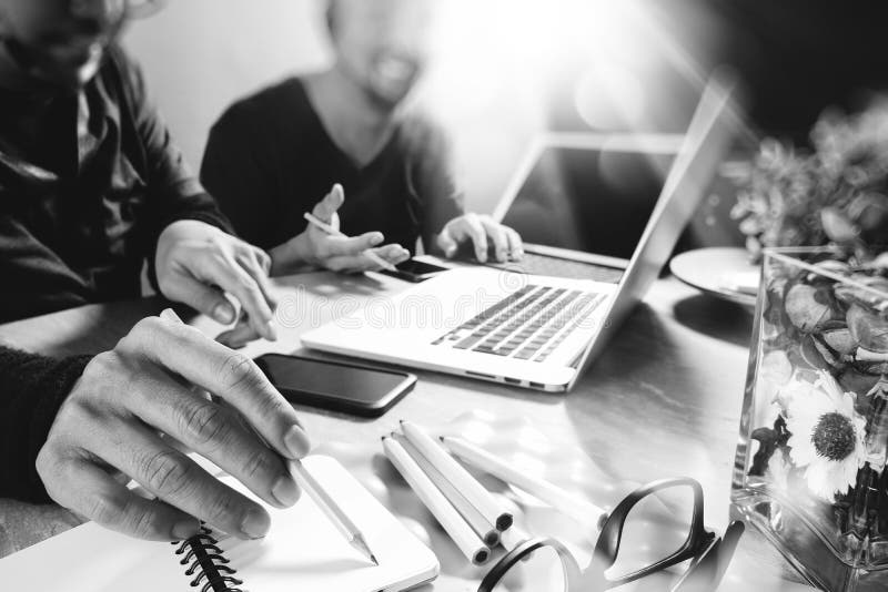 Co Worker Using VOIP Headset with Digital Tablet Computer Docking Smart ...