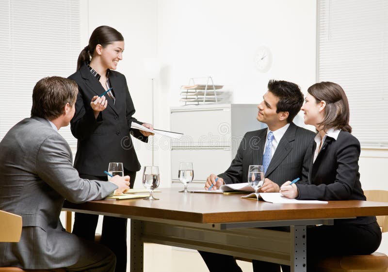 Co-worker Listening To Supervisor Explain Work Stock Photo - Image of ...