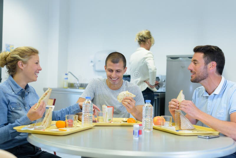 Co-workers at lunch break stock image. Image of smart - 148697979