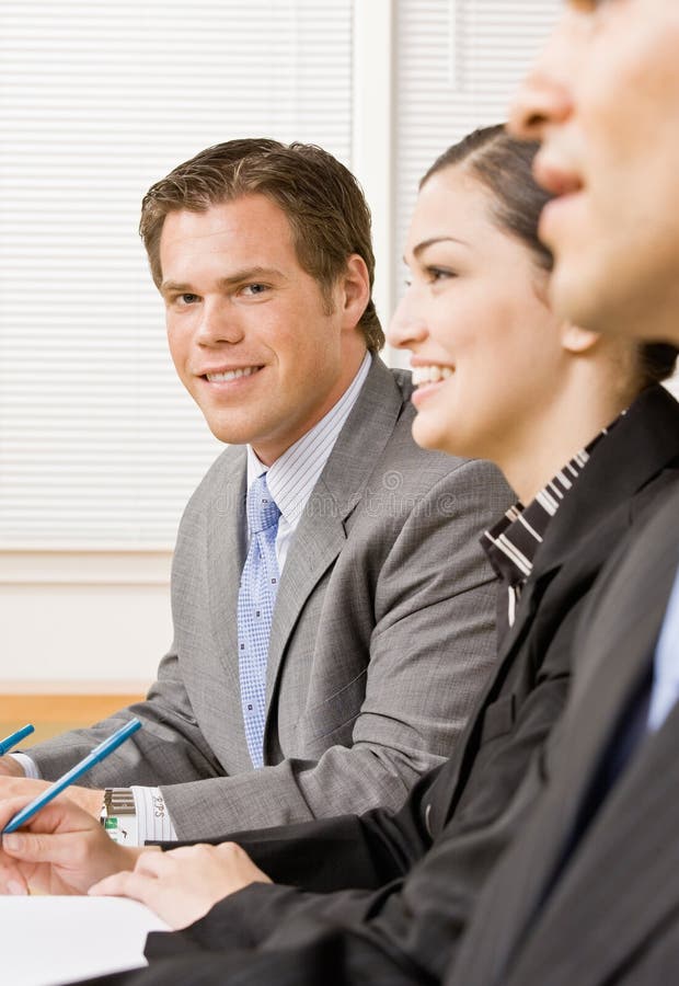 Co-workers Meeting at Table in Conference Room Stock Image - Image of ...