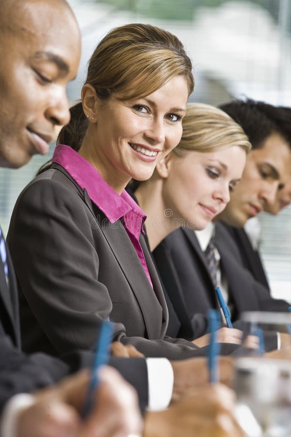 Co-workers Meeting at Table in Conference Room Stock Image - Image of ...