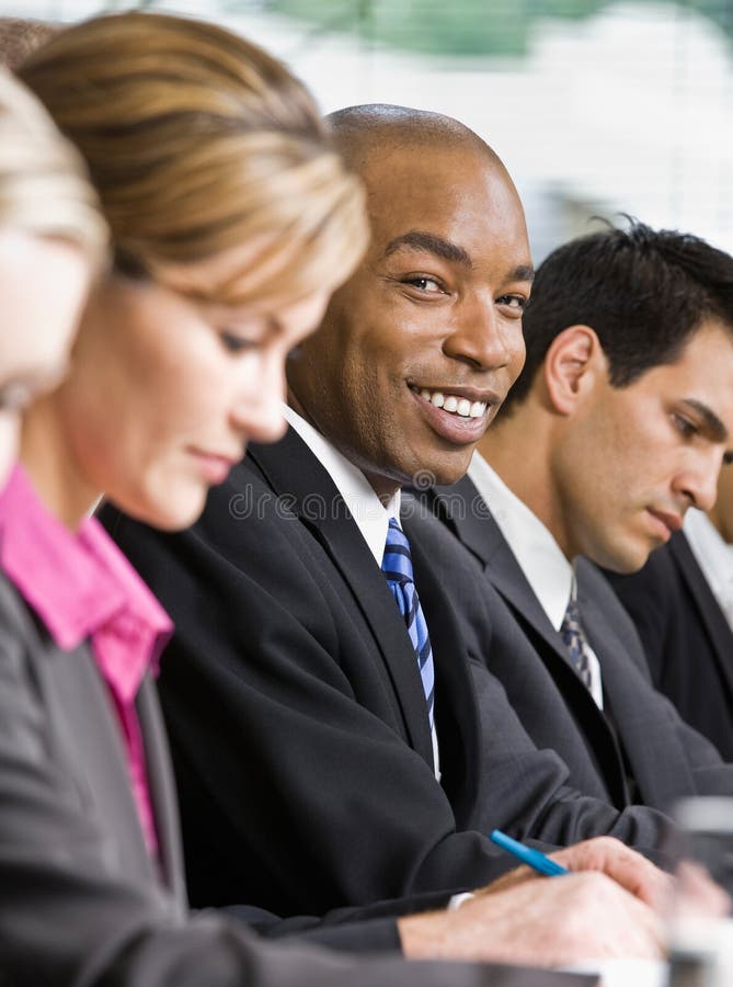 Co-workers Meeting at Table in Conference Room Stock Image - Image of ...