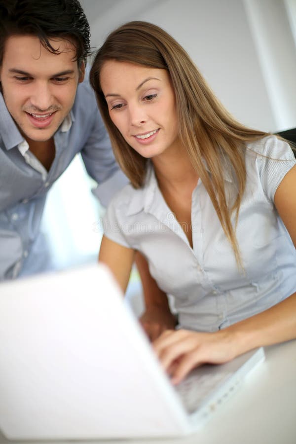 Co-workers in office stock photo. Image of young, caucasian - 26681590