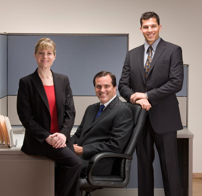 Co-workers Posing in Office Stock Image - Image of person, adult: 6580665