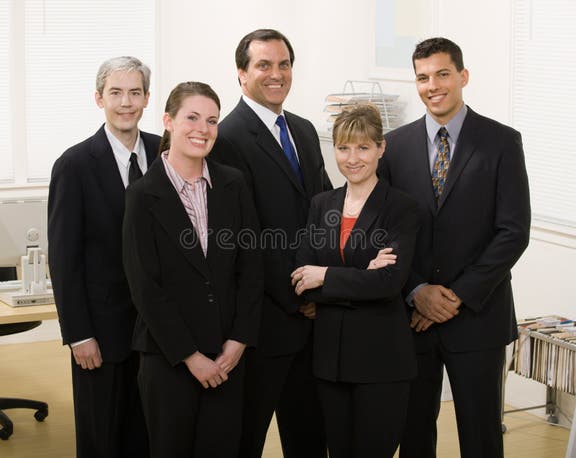 Co-workers Posing in Office Stock Image - Image of person, adult: 6580665
