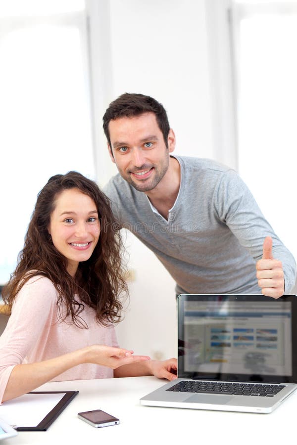 Co Workers Showing Their Finished Work Stock Photos - Free & Royalty ...