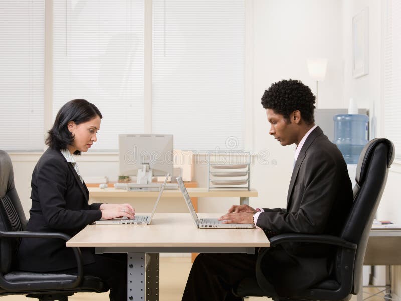 Businessman with Co-workers Text Messaging on Cell Stock Photo - Image ...