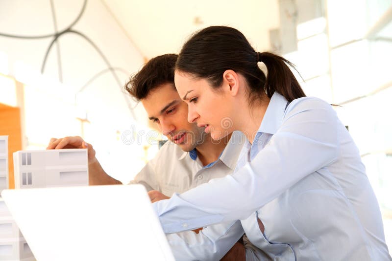 Co-workers Working on Project Stock Image - Image of construction ...