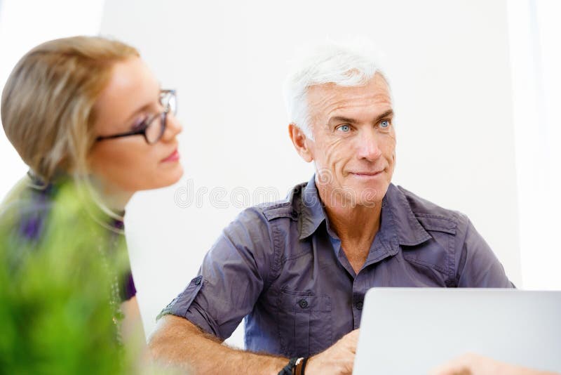 Co-workers Working Together Stock Image - Image of teamwork, computer ...