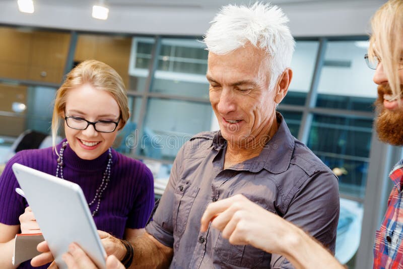 Co-workers Working Together Stock Photo - Image of designer, business ...