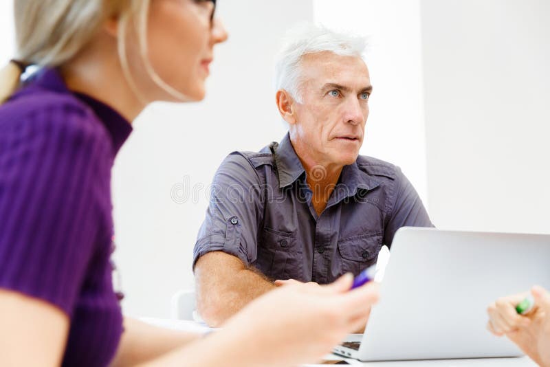 Co-workers Working Together Stock Image - Image of persons, tablet ...