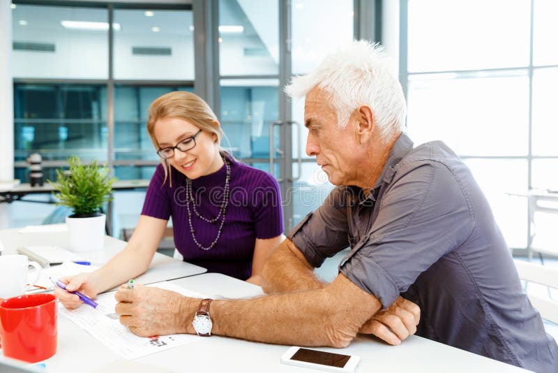 Co-workers Working Together Stock Image - Image of occupation, tablet ...