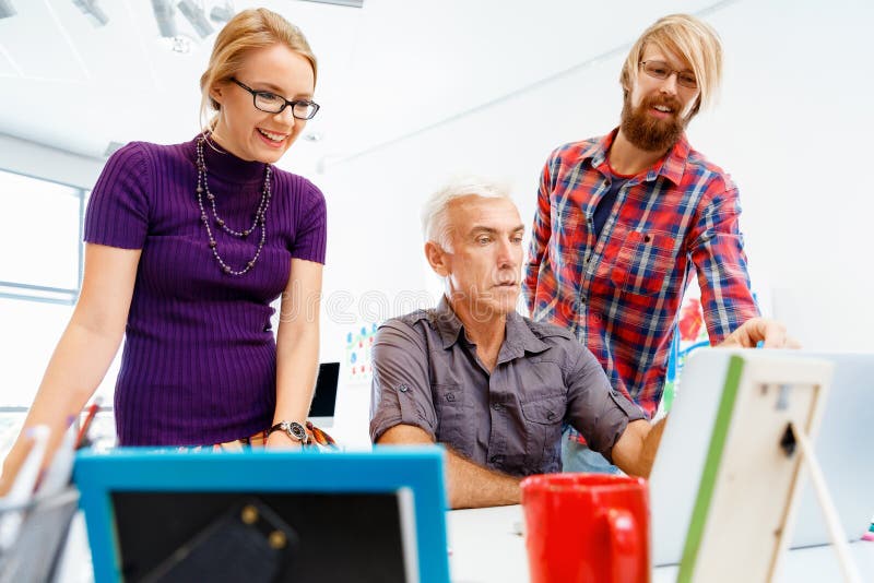 Co-workers Working Together Stock Photo - Image of strategy, desk: 92512274