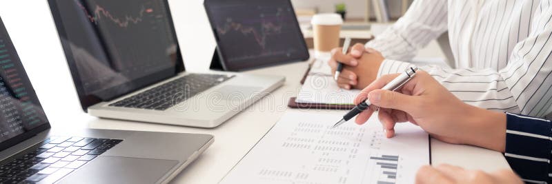 Co-working Concept the Co-workers Sitting Next To Each Other, Looking ...