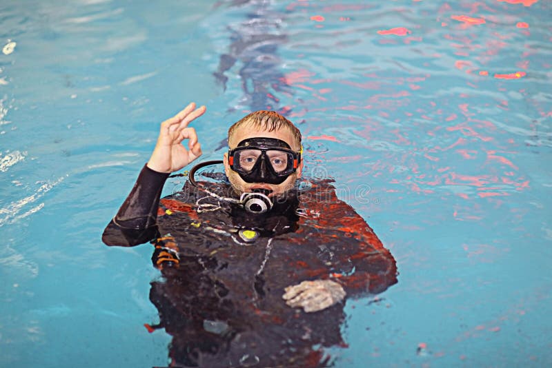 Coach diving in water stock photo. Image of suit, adult - 63963732