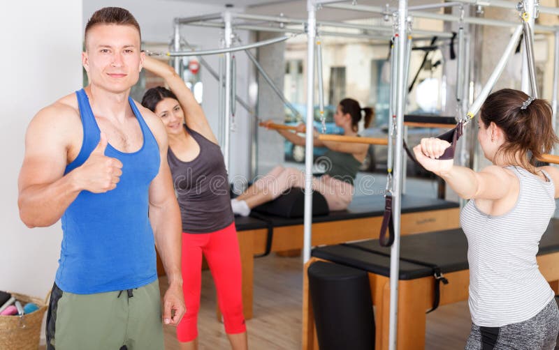 Coach With A Group Of Girls In The Modern Gym Stock Image - Image of ...