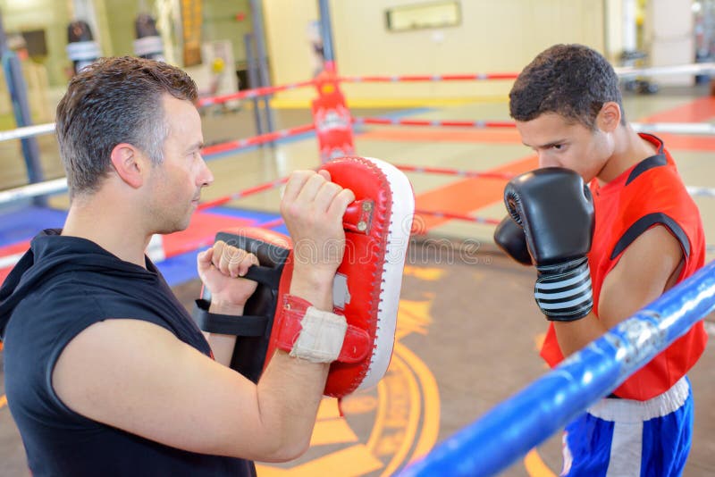 Coach and Man in Boxing Class Stock Image - Image of professional ...