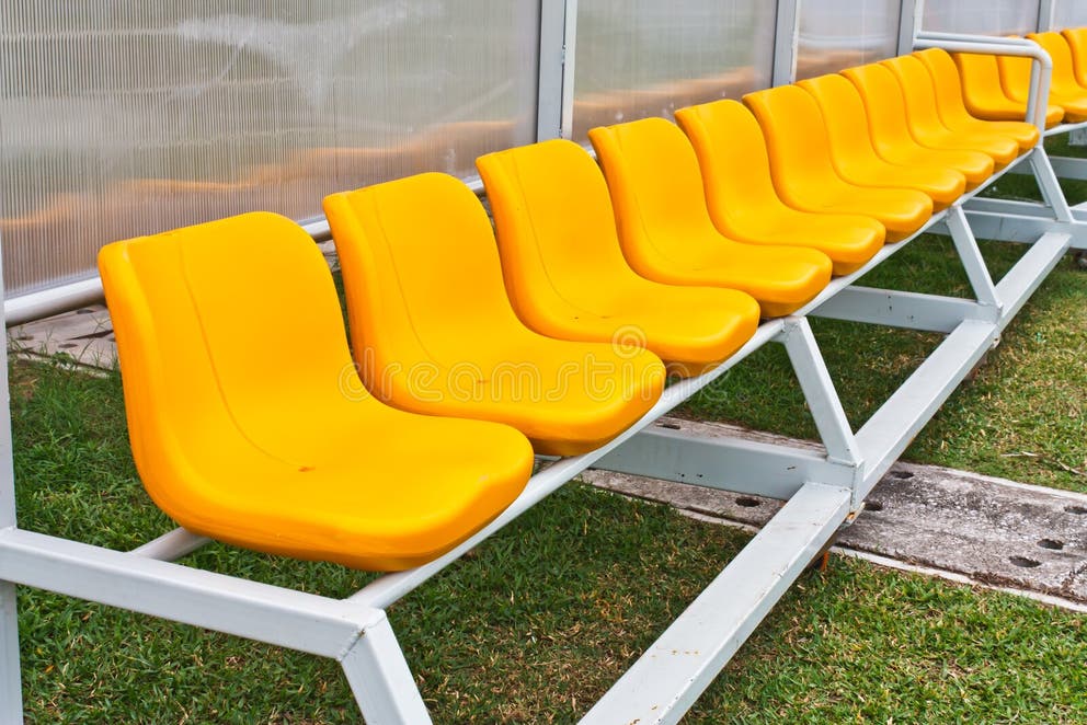 Coach and reserve benches stock image. Image of green - 25482945