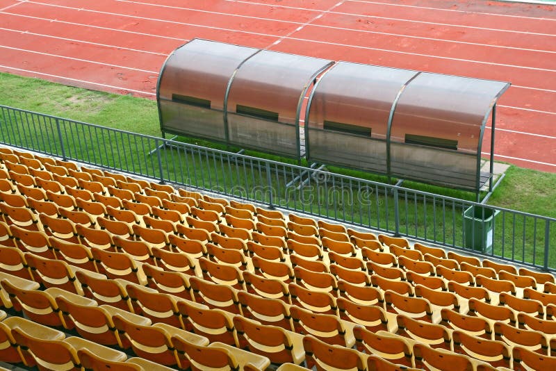 Coach and Reserve Benches with Yellow Seats Stock Photo - Image of ...
