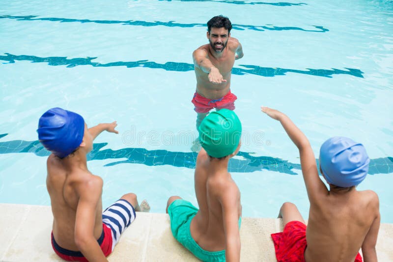 Coach and Students Taking Oath in Swimming Pool Stock Photo - Image of ...
