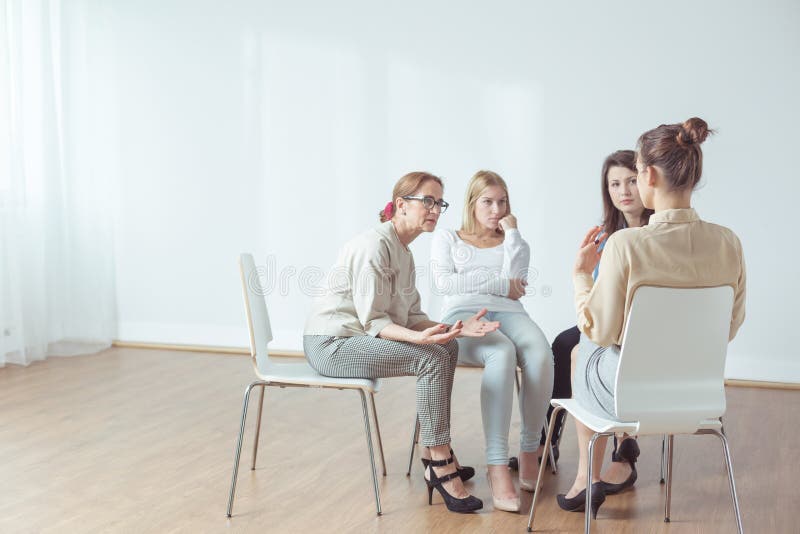 Coach and support group stock image. Image of discussion - 60790125