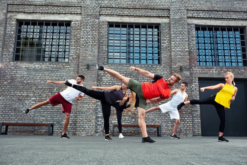 Coach Teaching His Group If Trainees about Leg Kicks Stock Photo ...