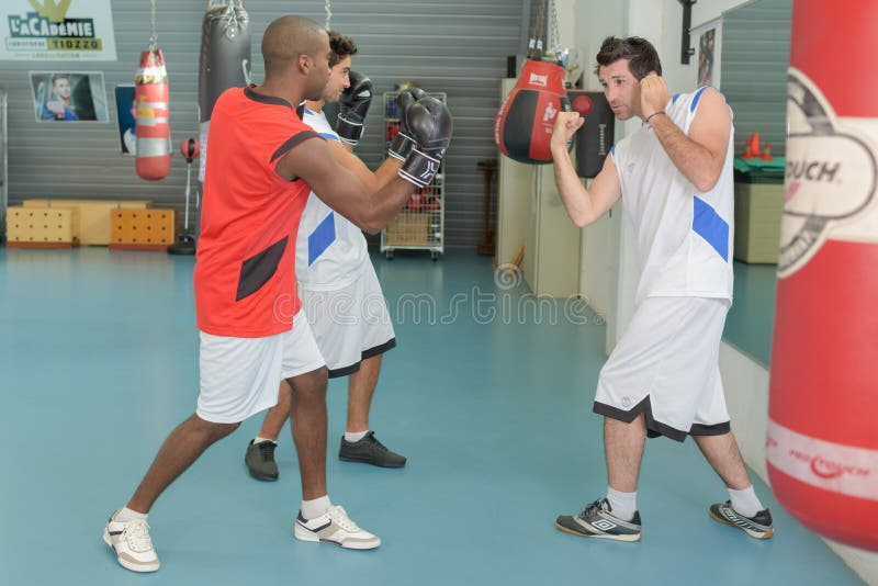 Coach training men boxing stock photo. Image of fight - 257189080