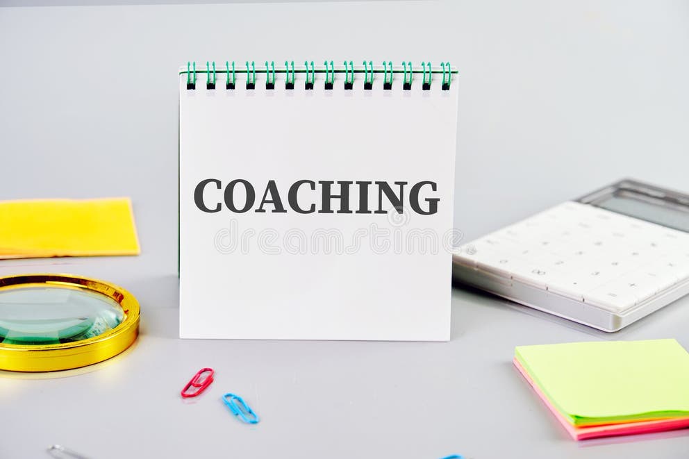 Coaching and Mentoring Concept. COACHING Written on a Blank Piece of ...