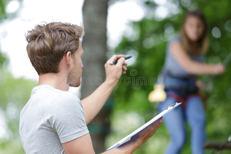Coaching Outdoor Pointing Up with Hands Stock Image - Image of green ...