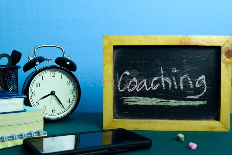 Coaching Planning on Background of Working Table with Office Supplies ...