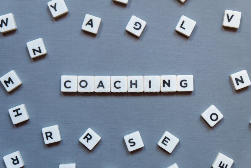 Coaching Word Made of Square Letter Word on Grey Background. Stock ...