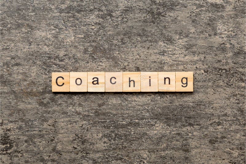 COACHING Word Written on Wood Block. COACHING Text on Table, Concept ...