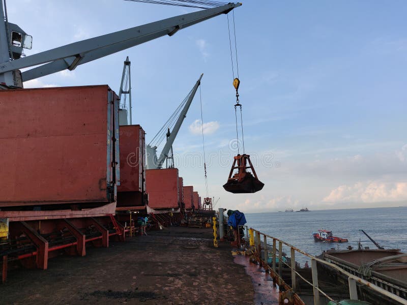 Coal Discharging Operation by Crane`s Grab and Excavator on Bulk Ship ...