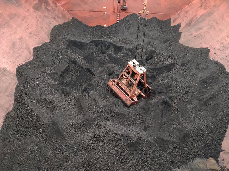 Coal Discharging Operation by Crane`s Grab on Bulk Ship Stock Photo ...