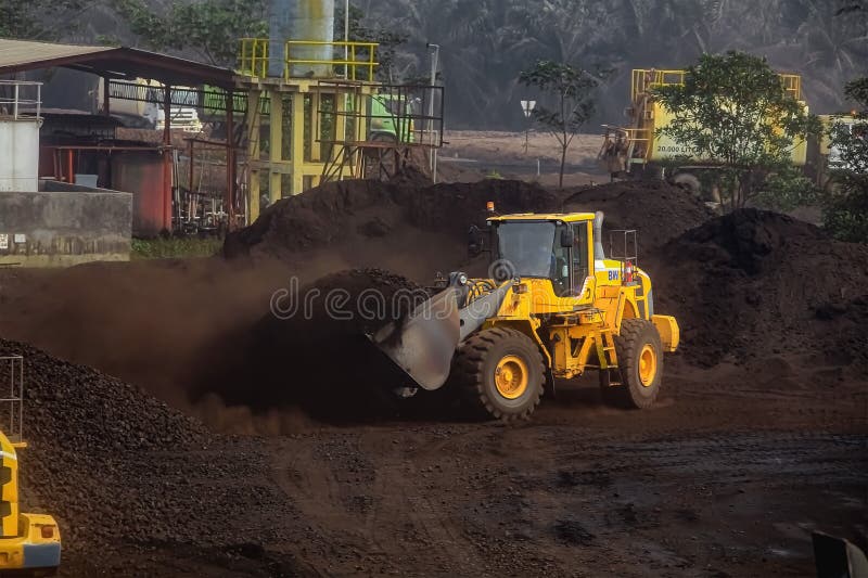 Transfer of Coal Mining Products by Wheel Loader in an Area. Stock ...