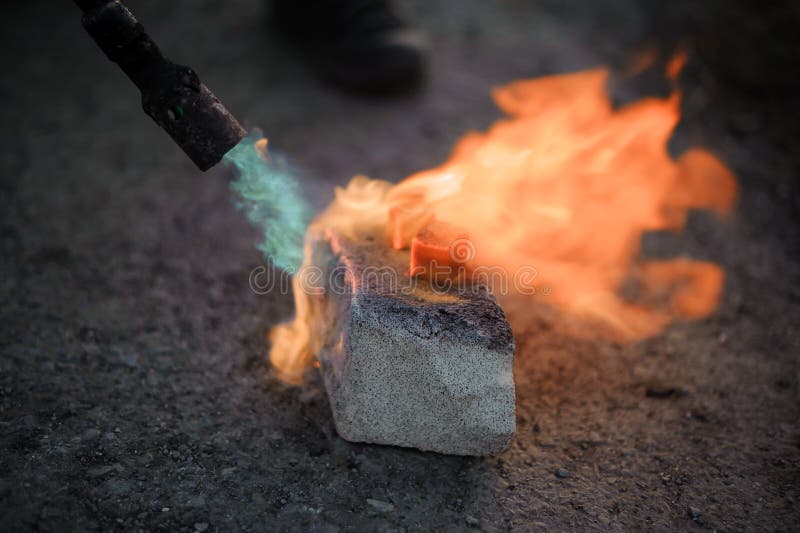 Coal on Fire. Ignition of Square Coal with a Gas Burner on a Stone ...