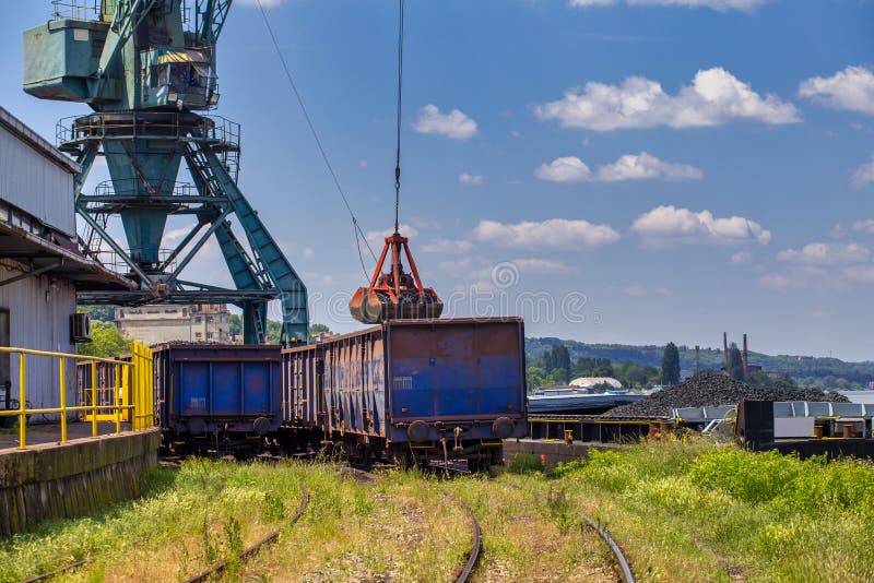 Coal Loading To Train Wagon with Special Crane Stock Photo - Image of ...