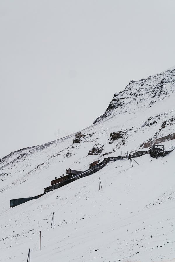 Coal Mine Abandoned in the Snow on Mountainside in Longyearbyen ...