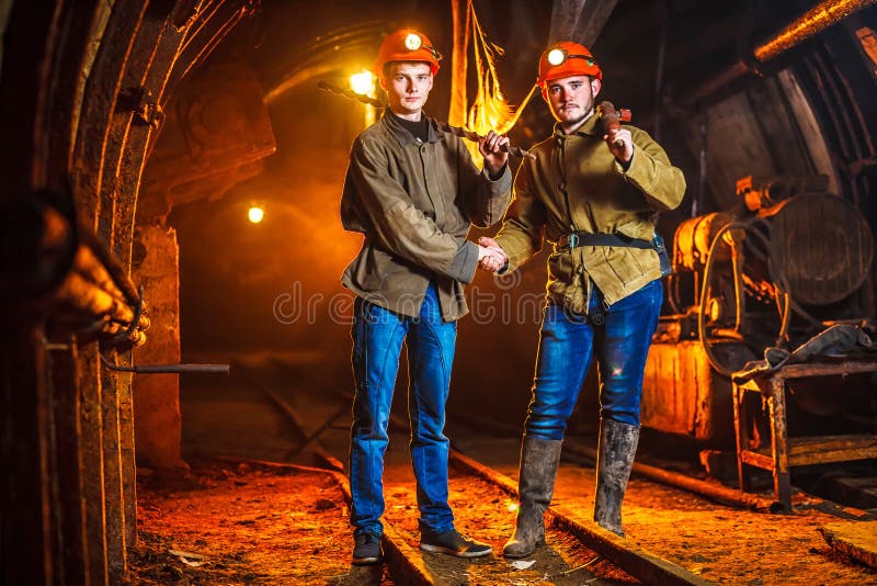 Coal Mine Excursion. Tired Workers in a Coal Mine. Hard Work in a Coal ...